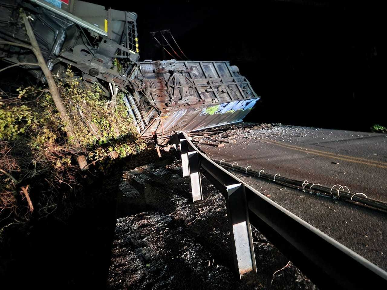 PHOTOS: Train Dangles Off Bridge Following Derailment In Central ...