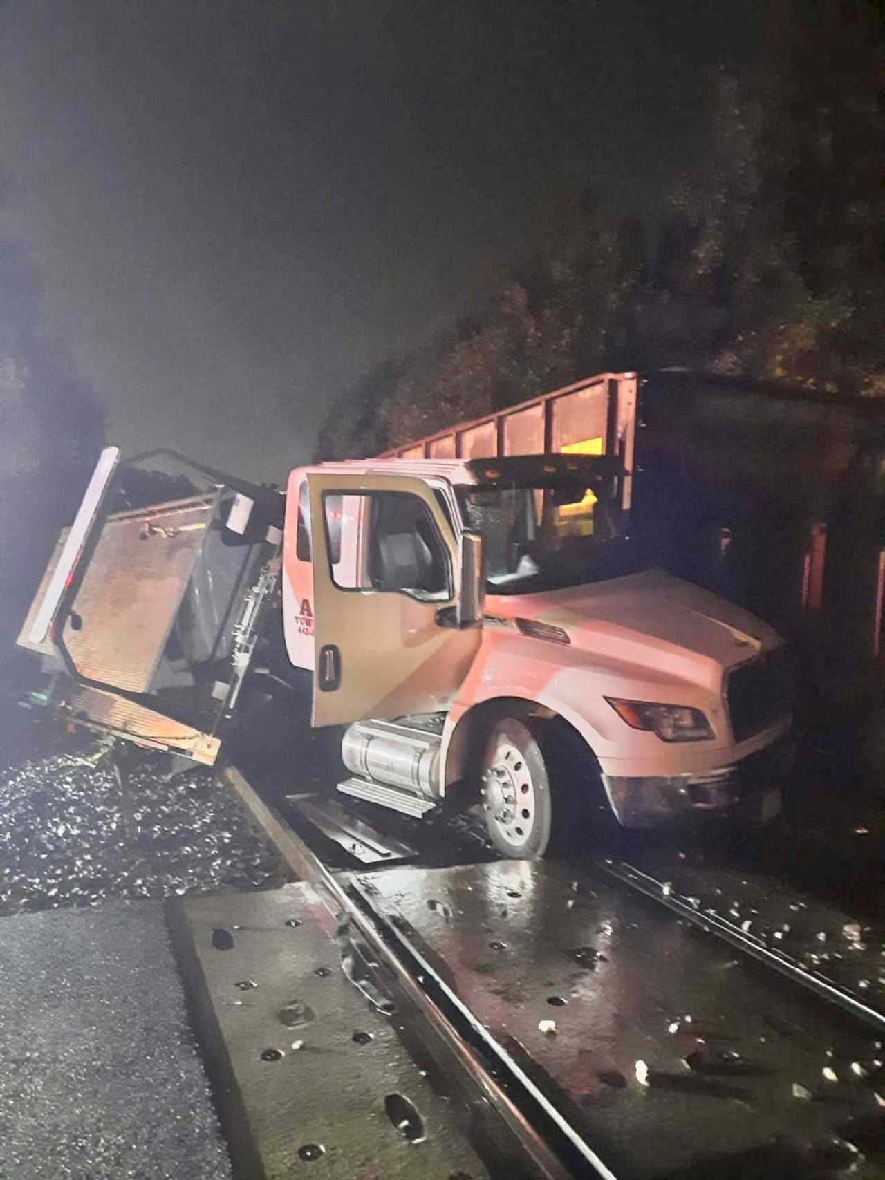 Freight Train Crashes Into Stalled Tow Truck In Silver Spring; No ...
