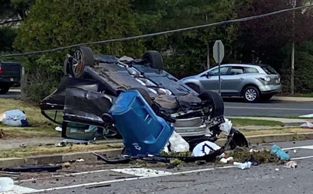 Driver Passenger Hospitalized As Car Slams Into Pole Flips In